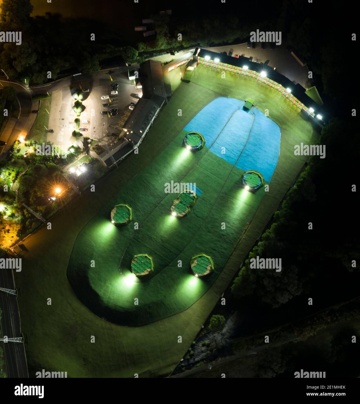 Golf driving range floodlight at night Stock Photo - Alamy