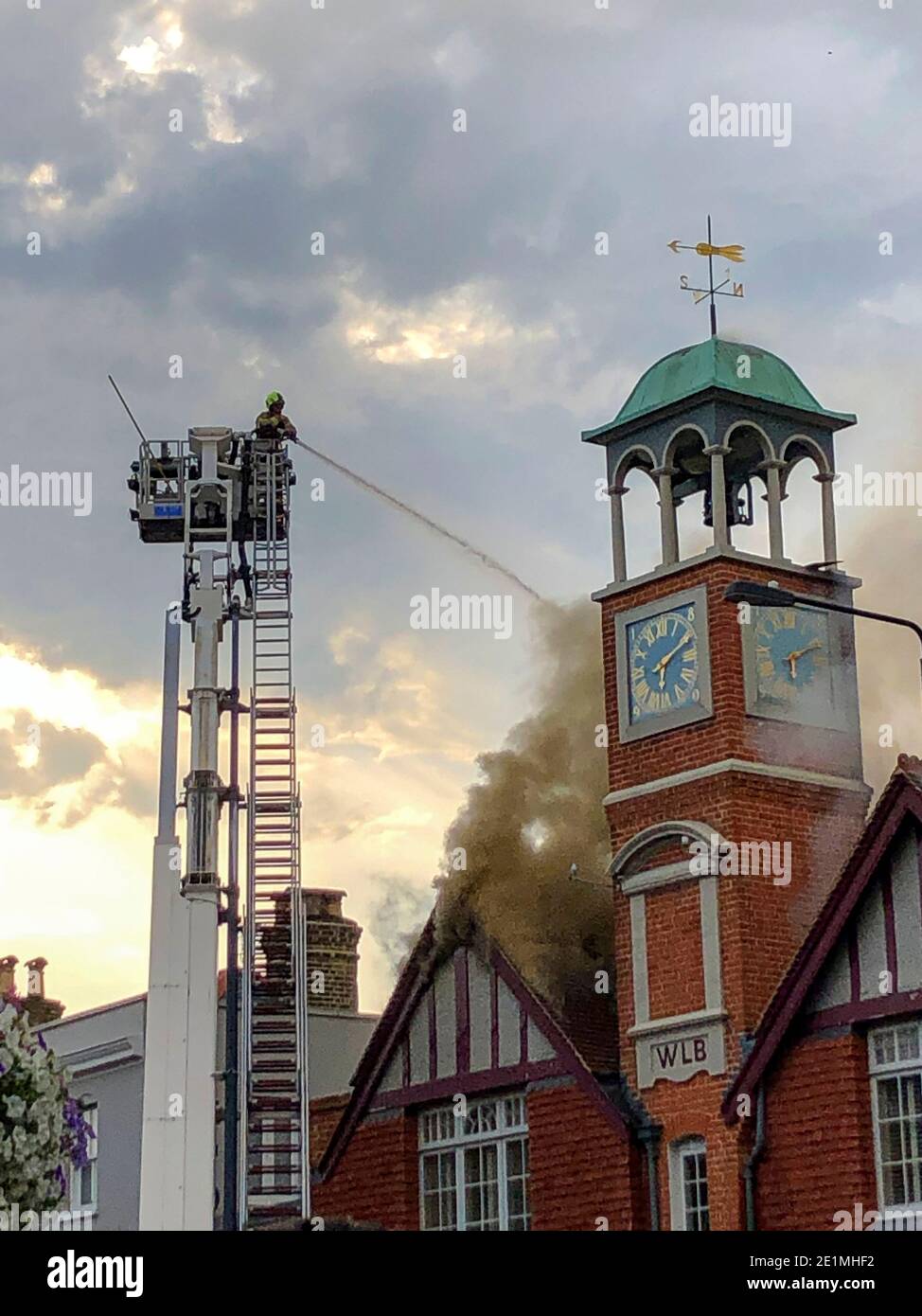Fire Brigade attended burning building Stock Photo - Alamy