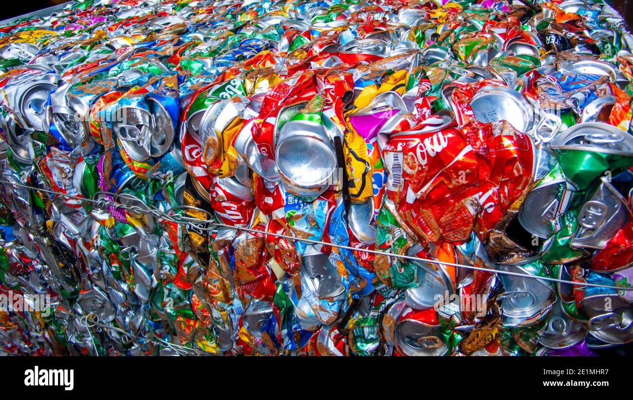 Soft drink metal cans crushed packaged for recycling Stock Photo - Alamy