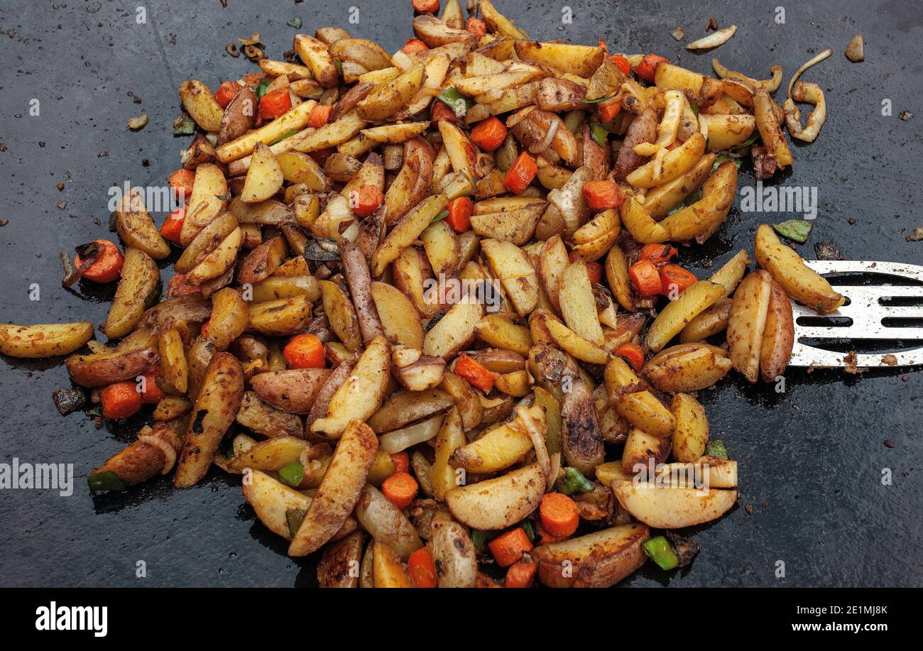 roasted roots on baking sheet photo: Bo Arrhed Stock Photo - Alamy