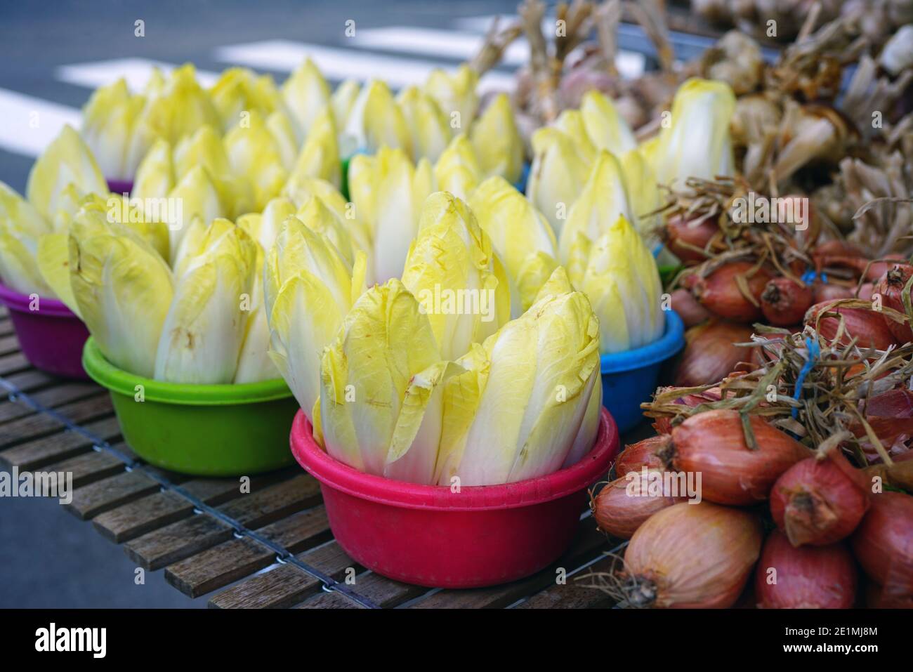 White Belgian endives at a farmers market Stock Photo - Alamy