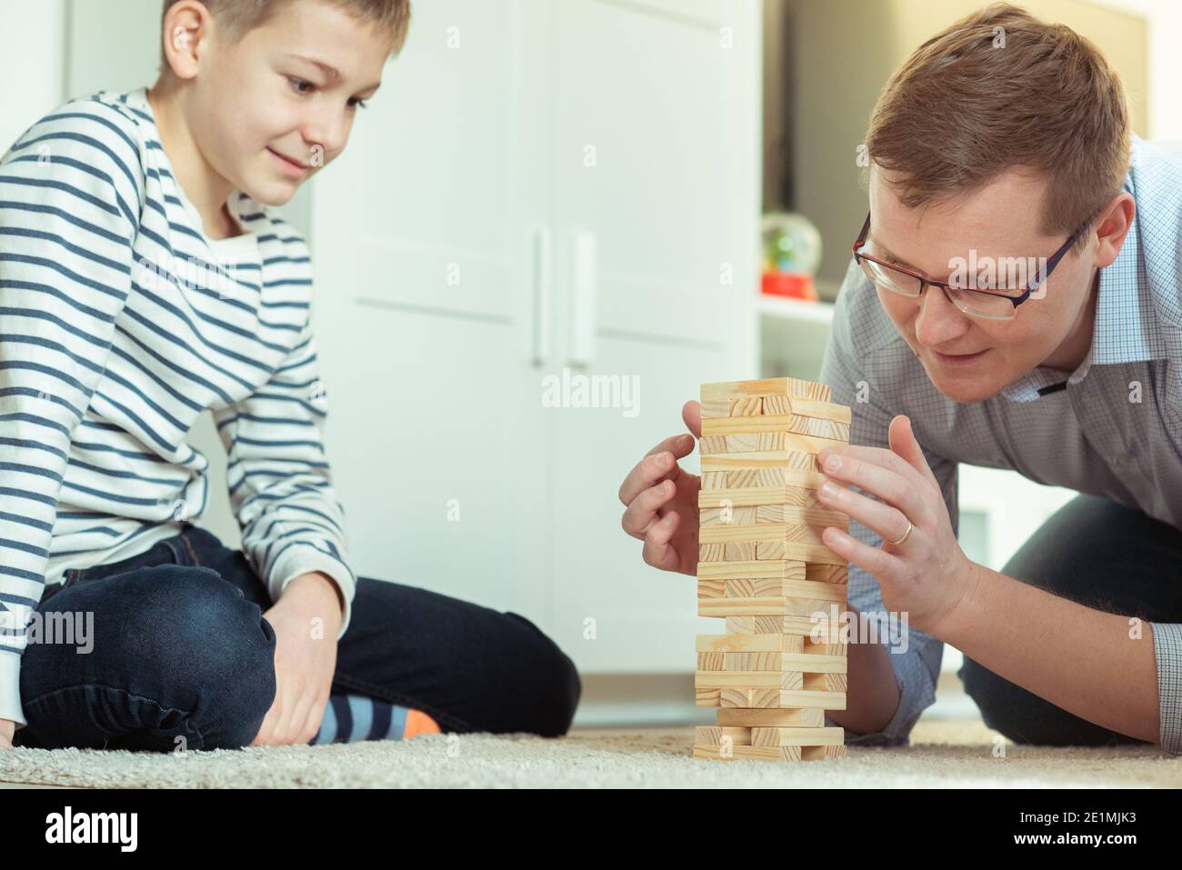 Father son play building blocks hi-res stock photography and images - Alamy