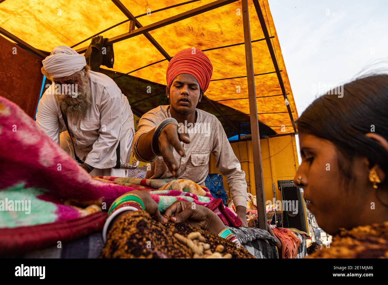 a sikh boy serving food during the protest at delhi haryana border ...