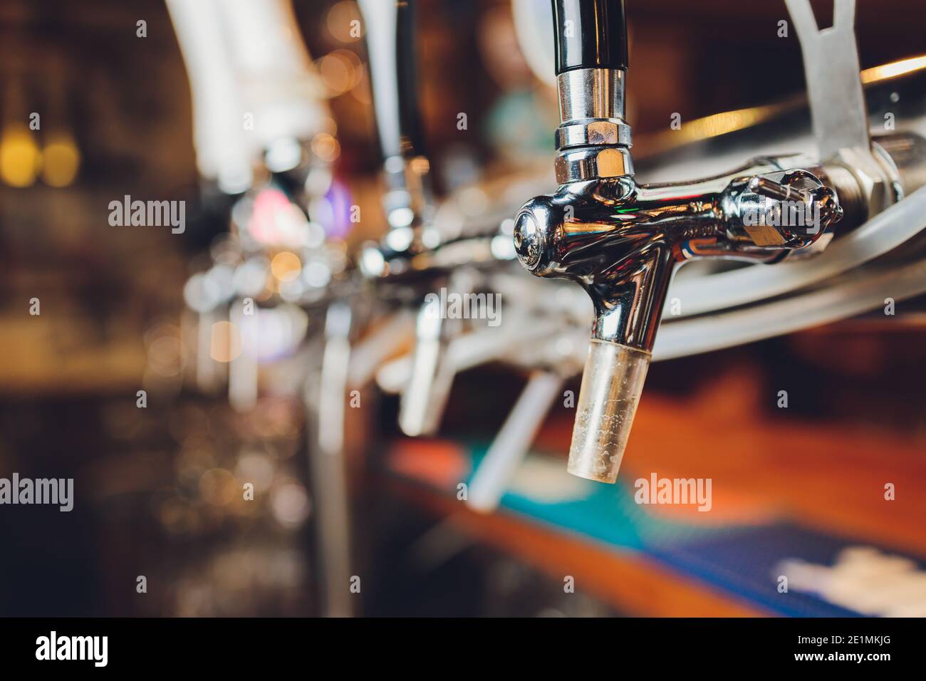 The bar counter with bottles and apparatus for dispensing beer ...