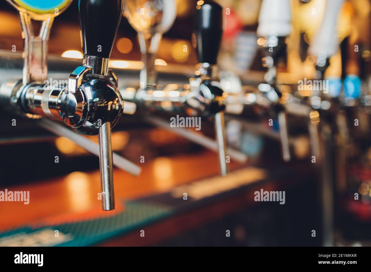 The bar counter with bottles and apparatus for dispensing beer ...
