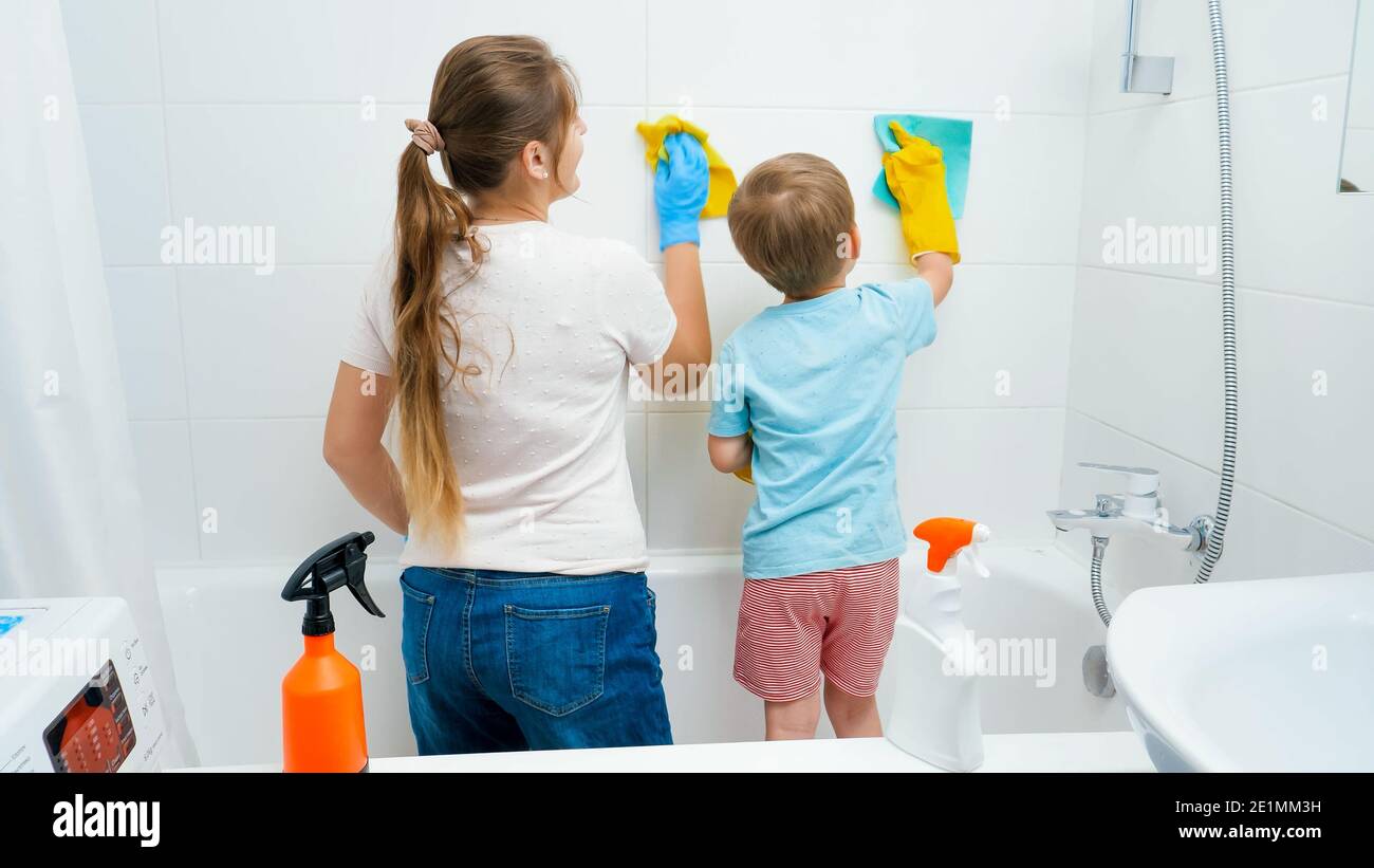 House maid cleaning house with kids hi-res stock photography and images ...