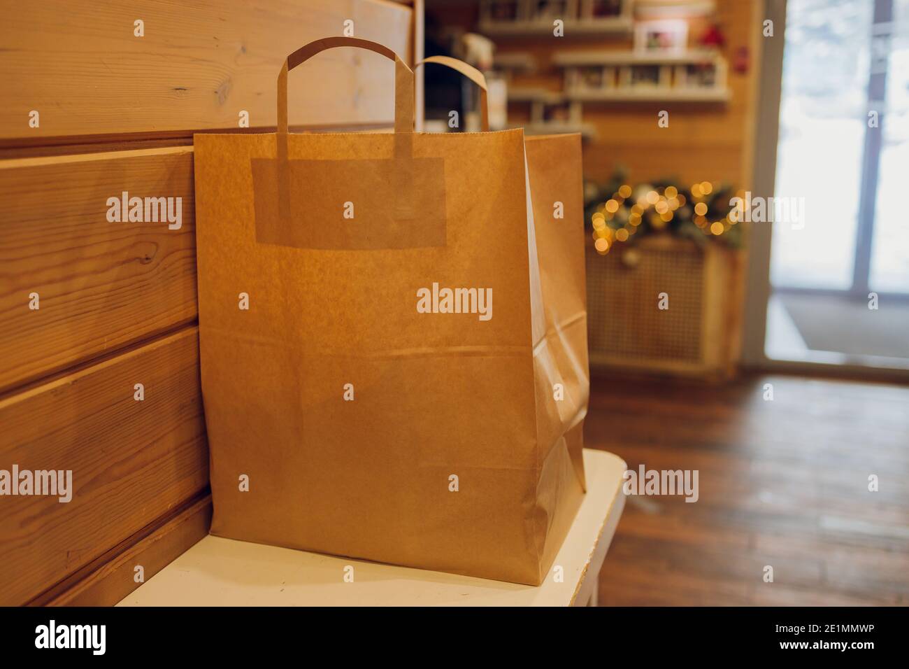 dessert paper bag waiting for customer on counter in modern cafe coffee ...
