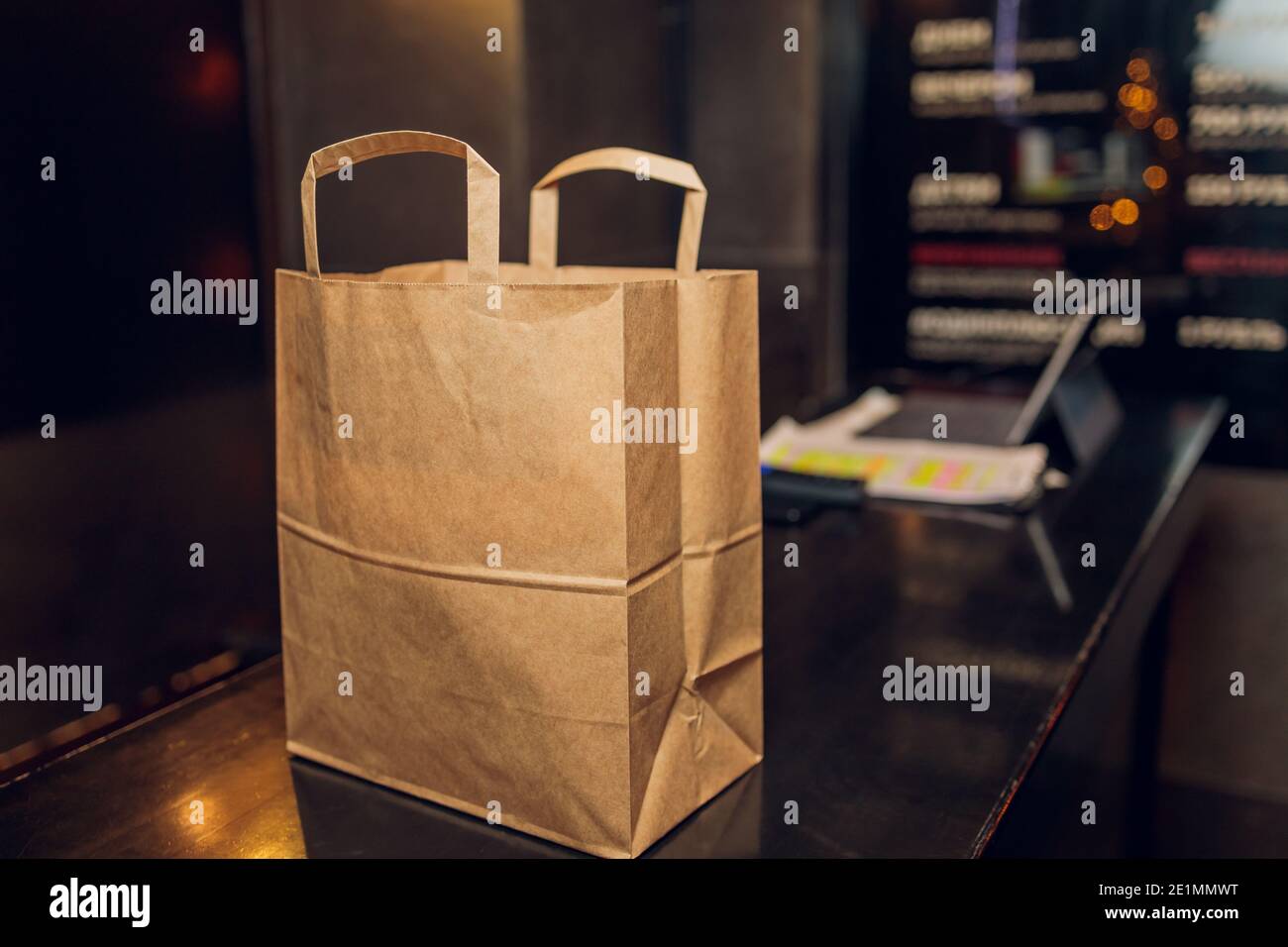 dessert paper bag waiting for customer on counter in modern cafe coffee ...