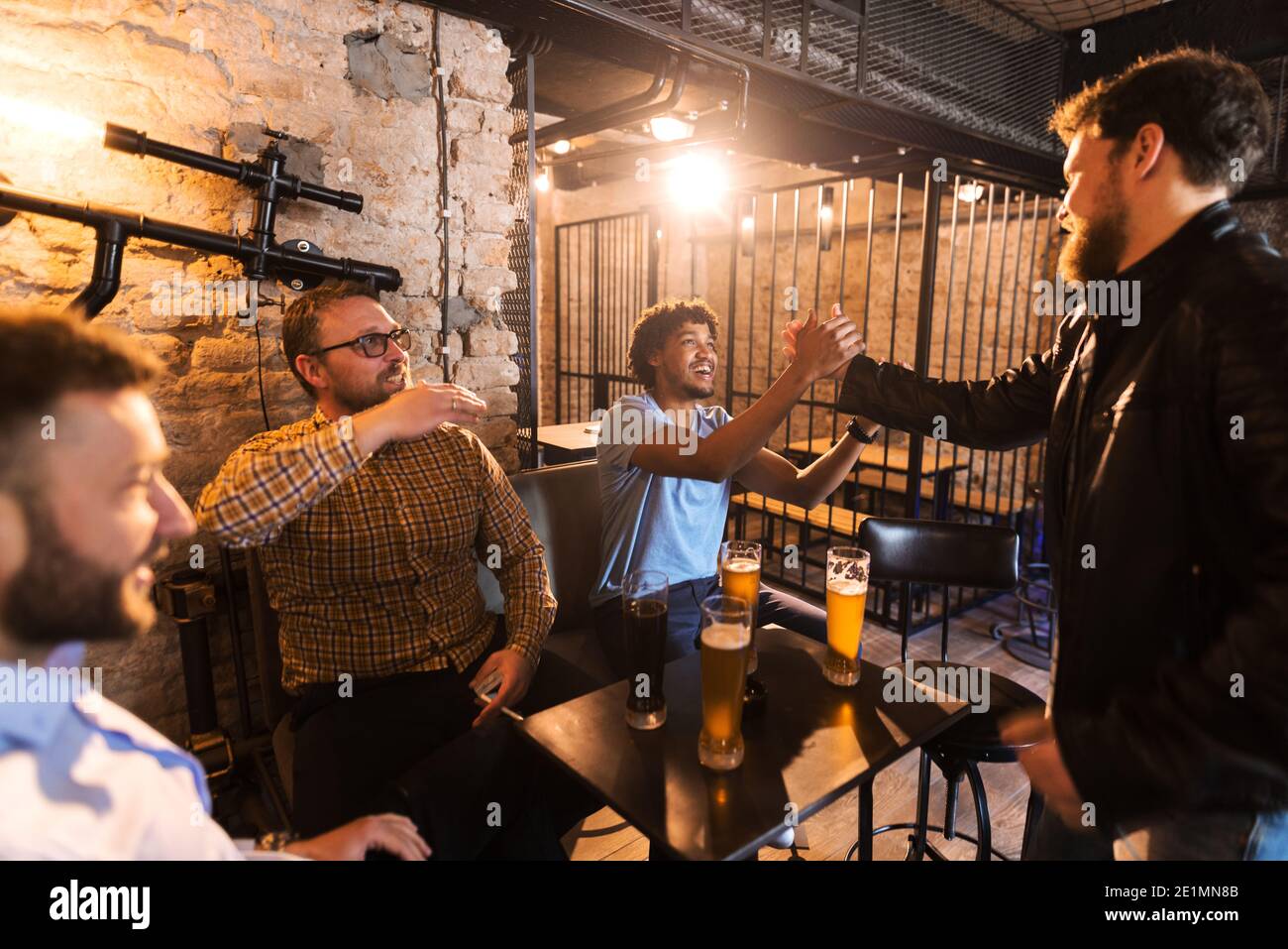 Friends handshake party hi-res stock photography and images - Alamy