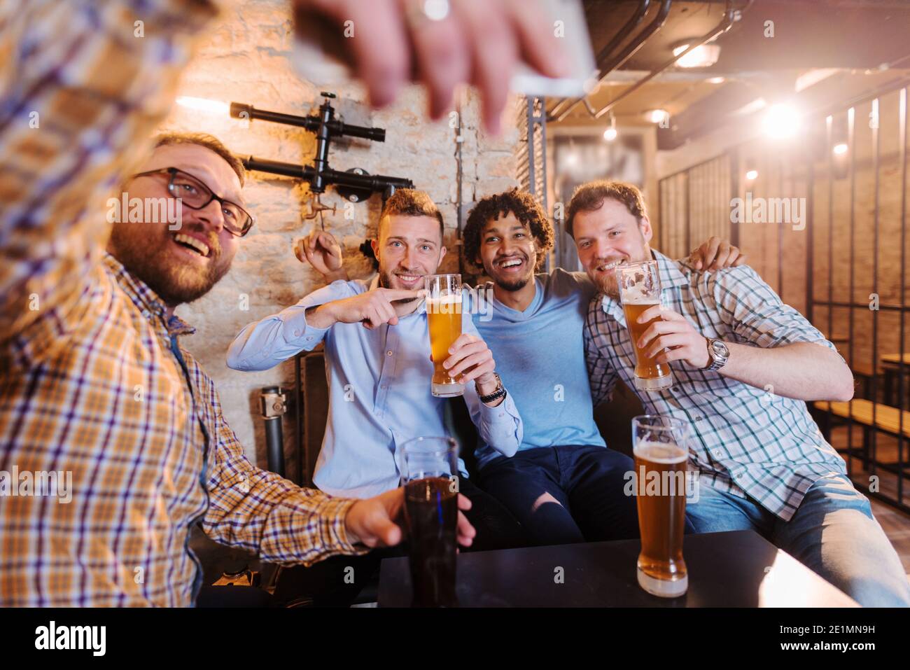 Smart men drinking in pub hi-res stock photography and images - Alamy