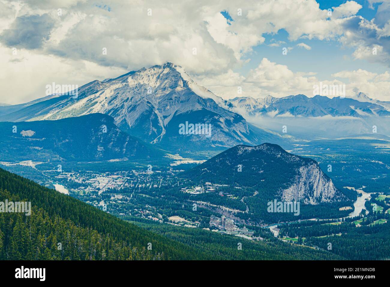 High shot of the town of Banff with Cascade Mountain towering above in ...