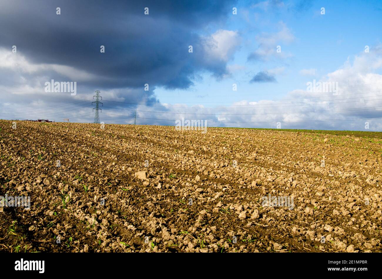 Agricultral field in the stormy weather with the ground prepared for ...