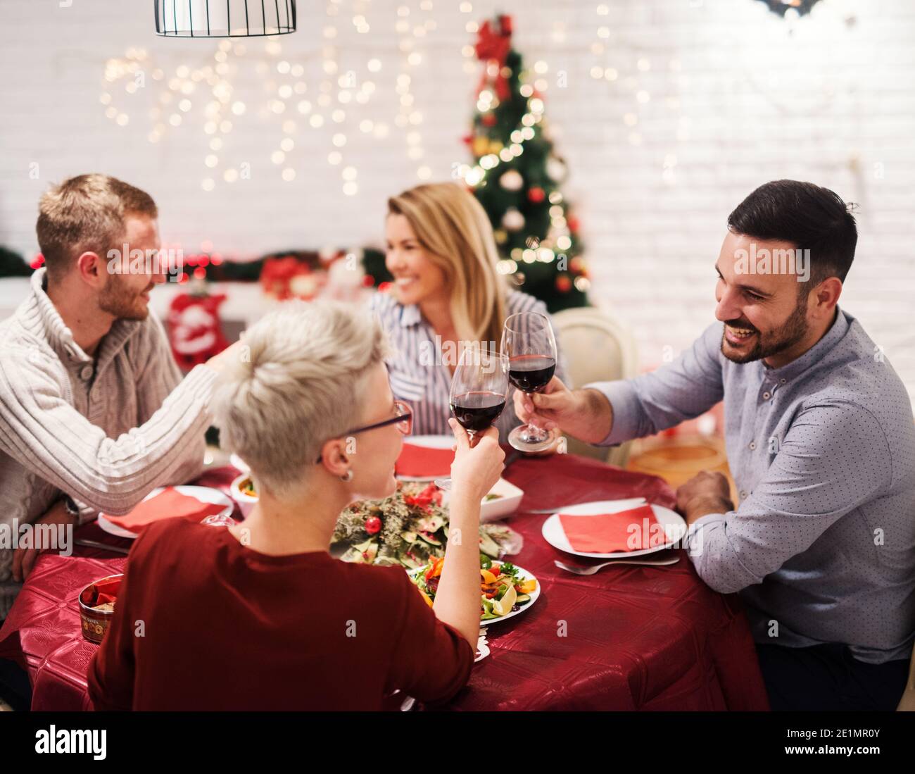 Two couples dinner table hi-res stock photography and images - Alamy