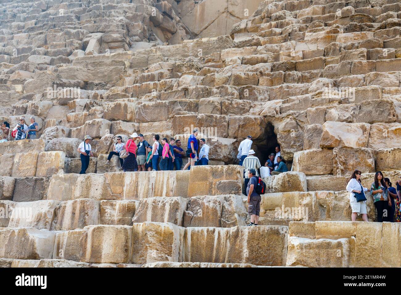 Tourists gather at the entrance to the Great Pyramid of Cheops (Khufu ...