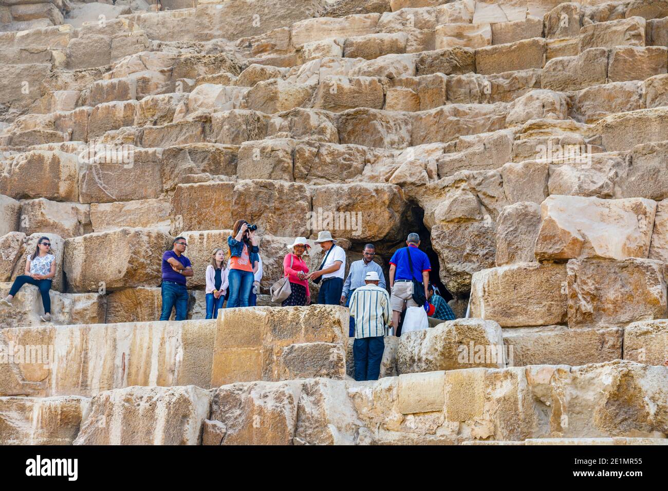Tourists gather at the entrance to the Great Pyramid of Cheops (Khufu ...