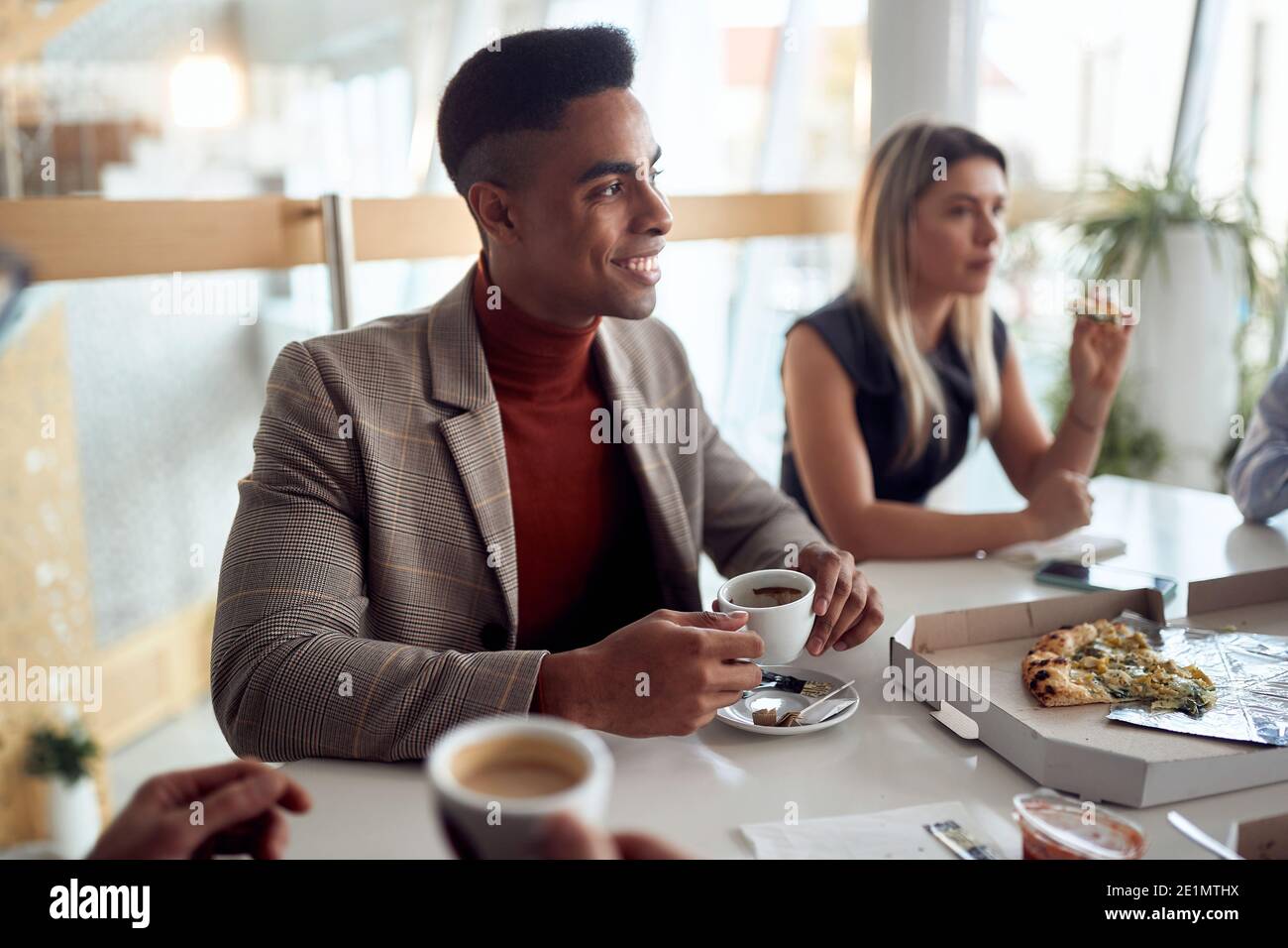 Business people discussing work drinking hi-res stock photography and ...