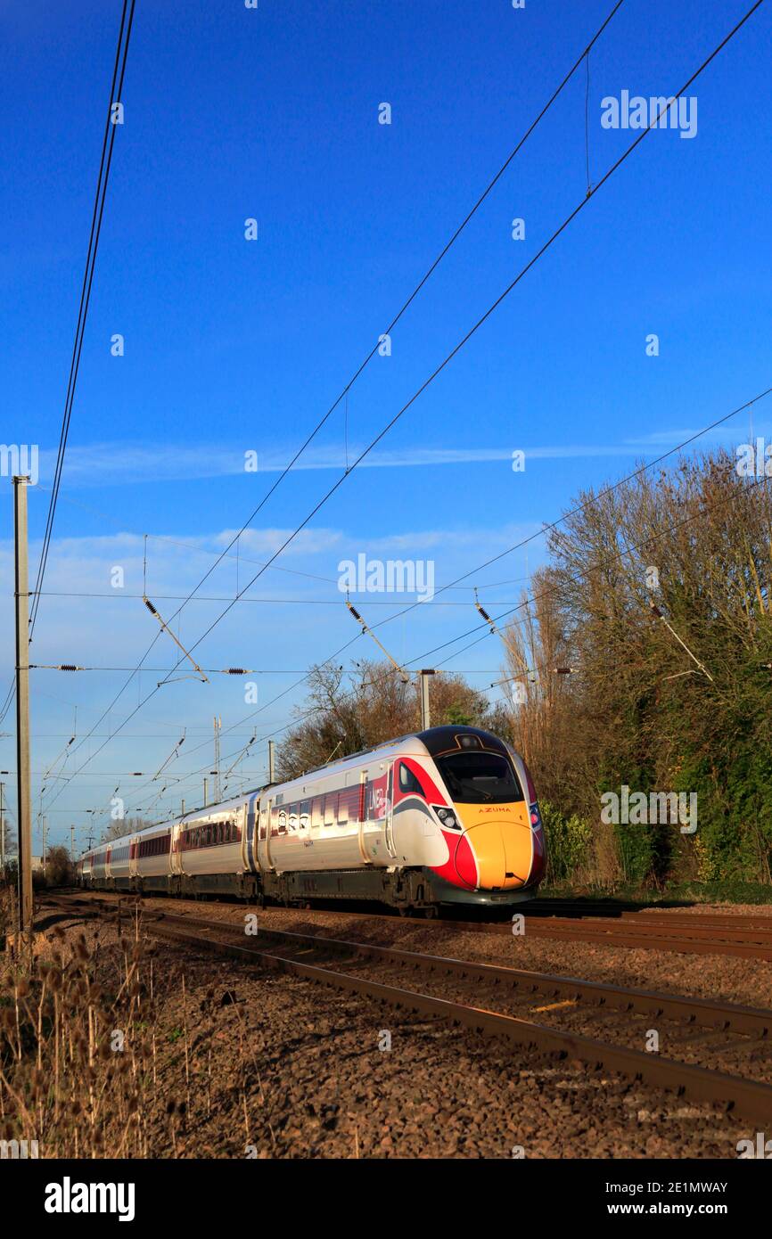 LNER, Azuma 800 class train passing Offord Cluny village, East Coast ...