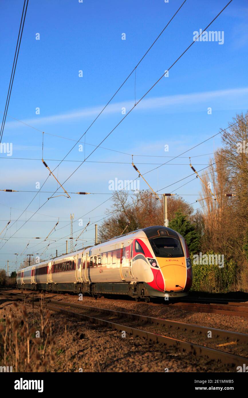 LNER, Azuma 800 class train passing Offord Cluny village, East Coast ...