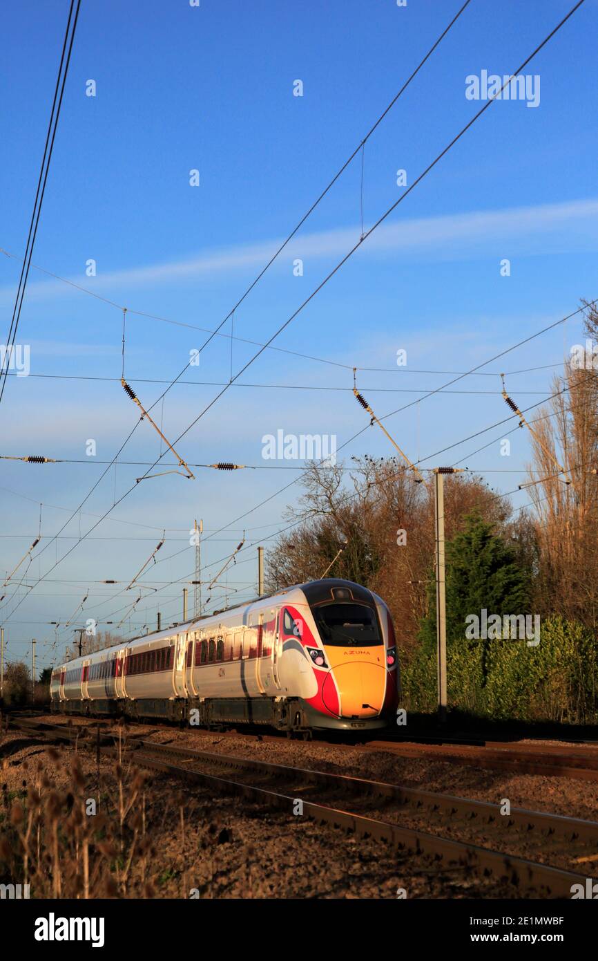 LNER, Azuma 800 class train passing Offord Cluny village, East Coast ...