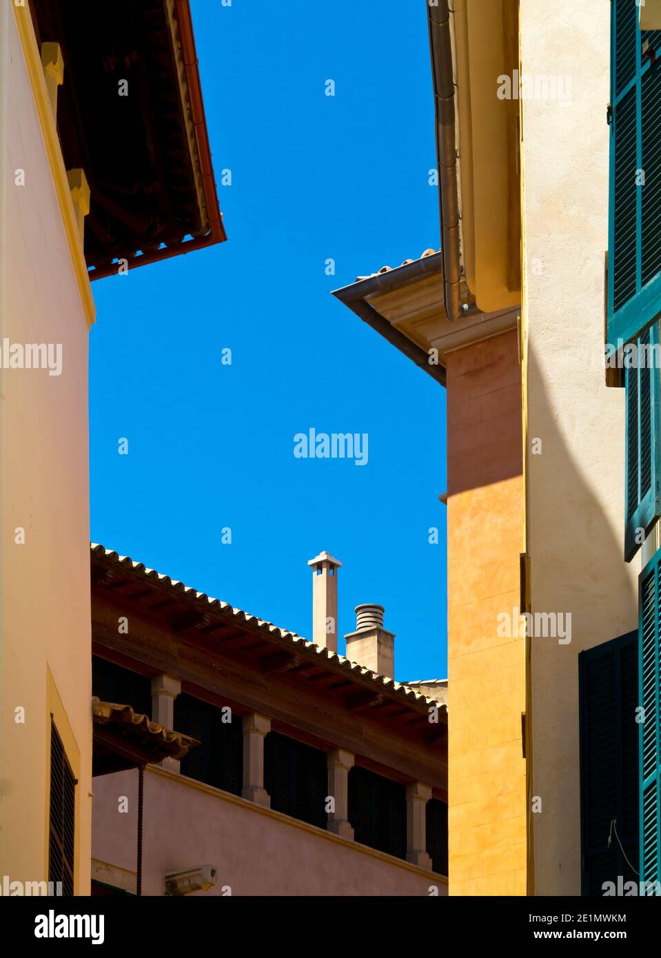 Narrow streets with houses and shuttered windows in the Sa Portella ...