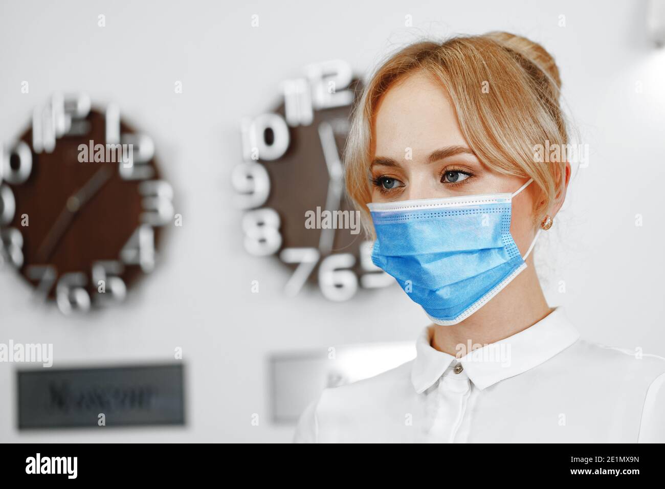 Hotel receptionist mask hi-res stock photography and images - Alamy