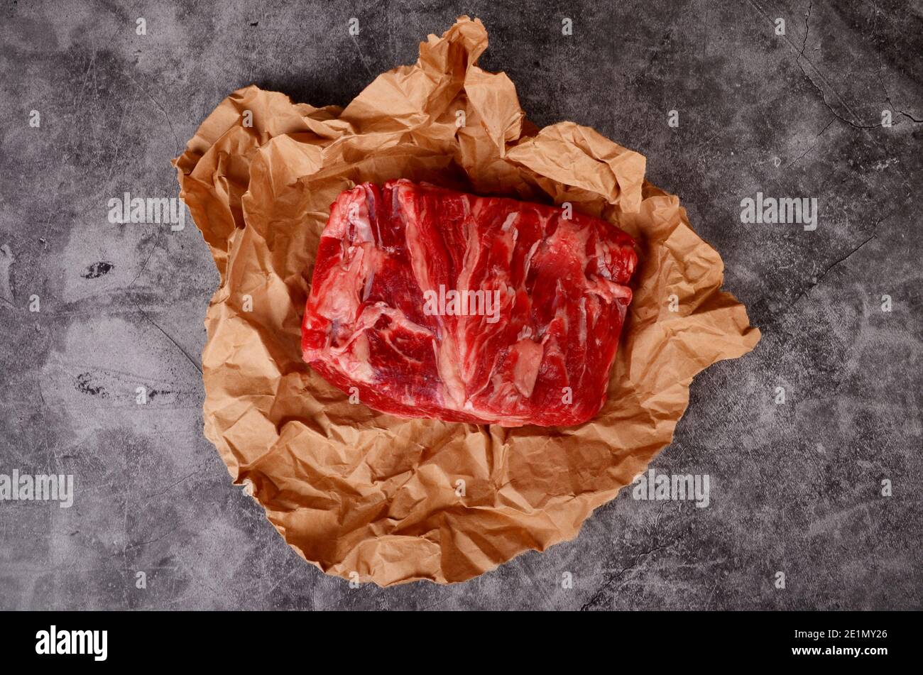 Raw beef ribeye steak on a baking paper. beef steak antrecot Stock ...