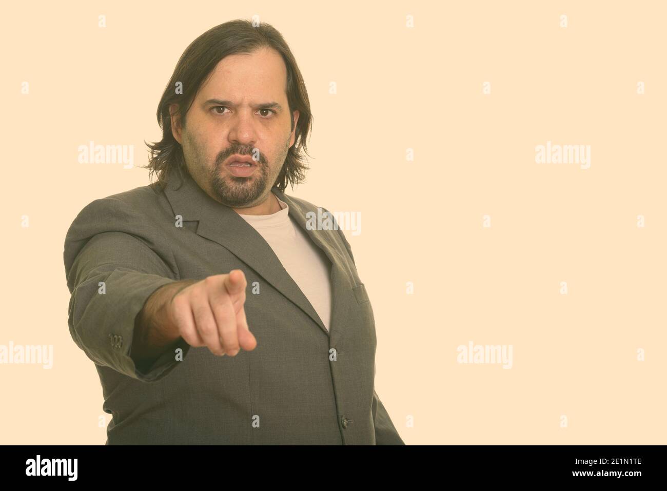Angry fat Caucasian businessman pointing finger Stock Photo - Alamy