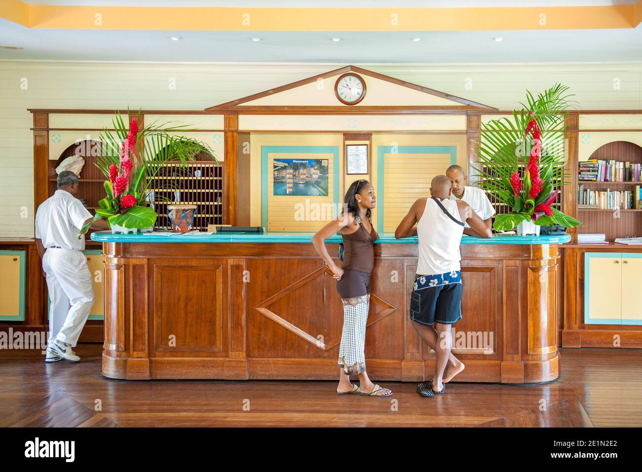 Inside interior lobby front check in reception desk hi-res stock ...