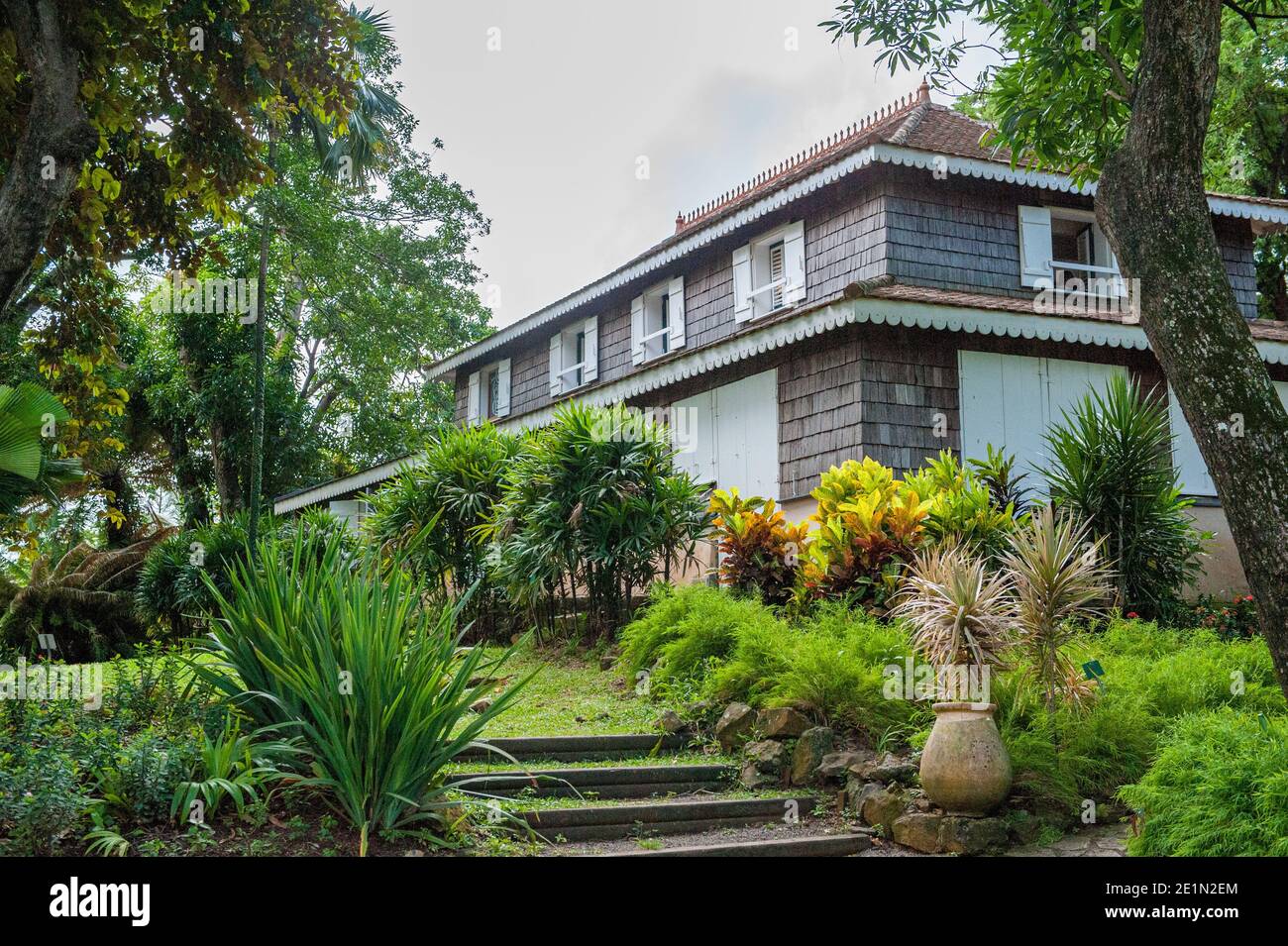 French colonial style mansion in rural Martinique. Martinique is a ...