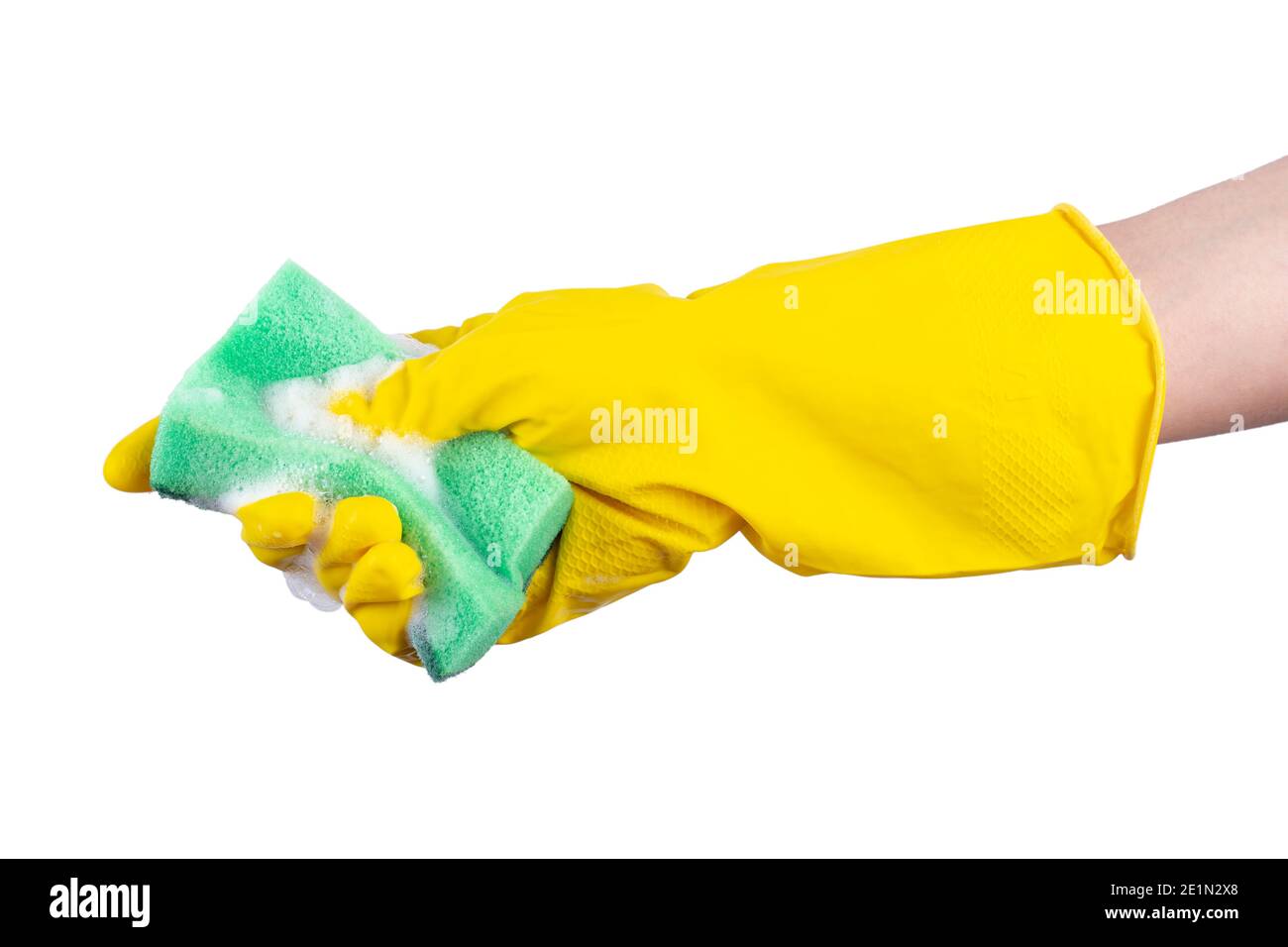 Cleaning concept - hand in a yellow rubber glove holds a green sponge ...
