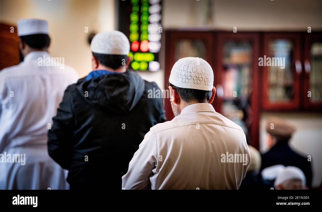 People praying inside a mosque in the South East of the UK Stock Photo ...
