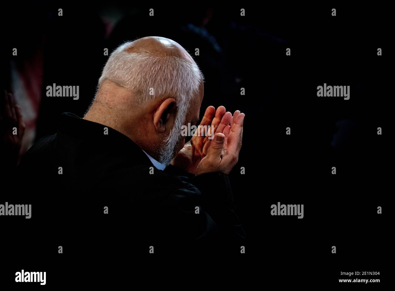 Hands in prayer behind back hi-res stock photography and images - Alamy