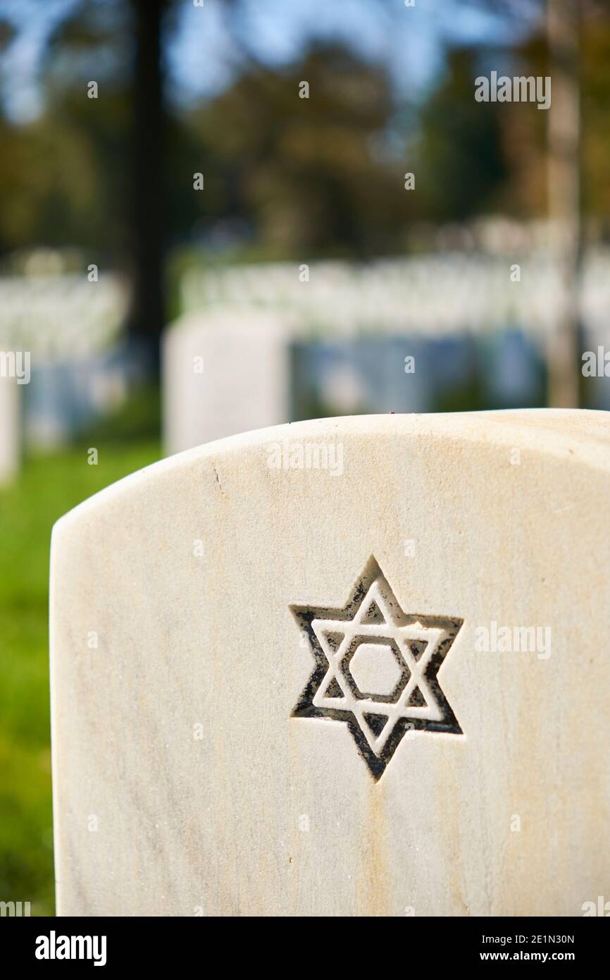 Detail of a stone grave with a Star of David for a Jewish veteran. At ...