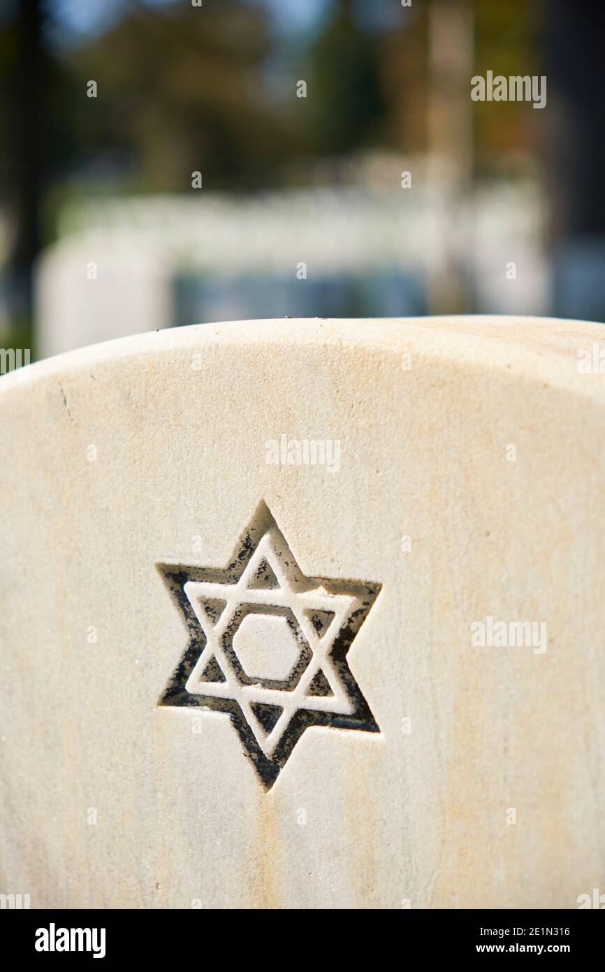 Detail of a stone grave with a Star of David for a Jewish veteran. At ...