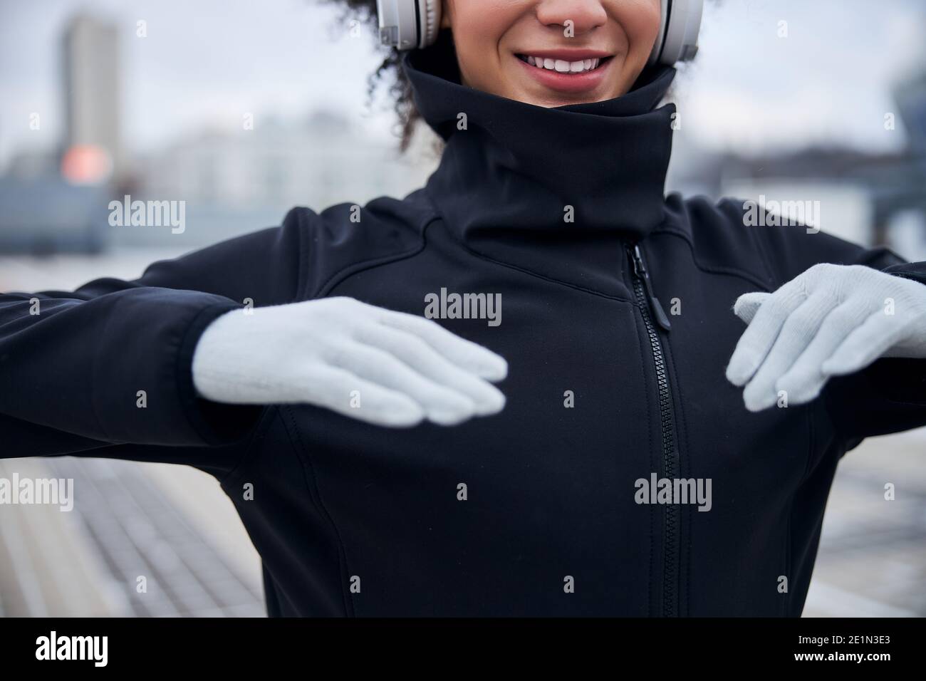Sportsperson keeping hands raised in front of chest Stock Photo - Alamy