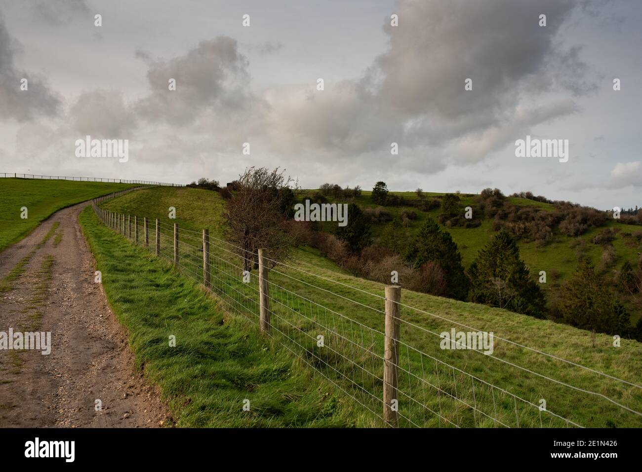 Kingsclere downs on overcast clouds weather with rolling hills ...