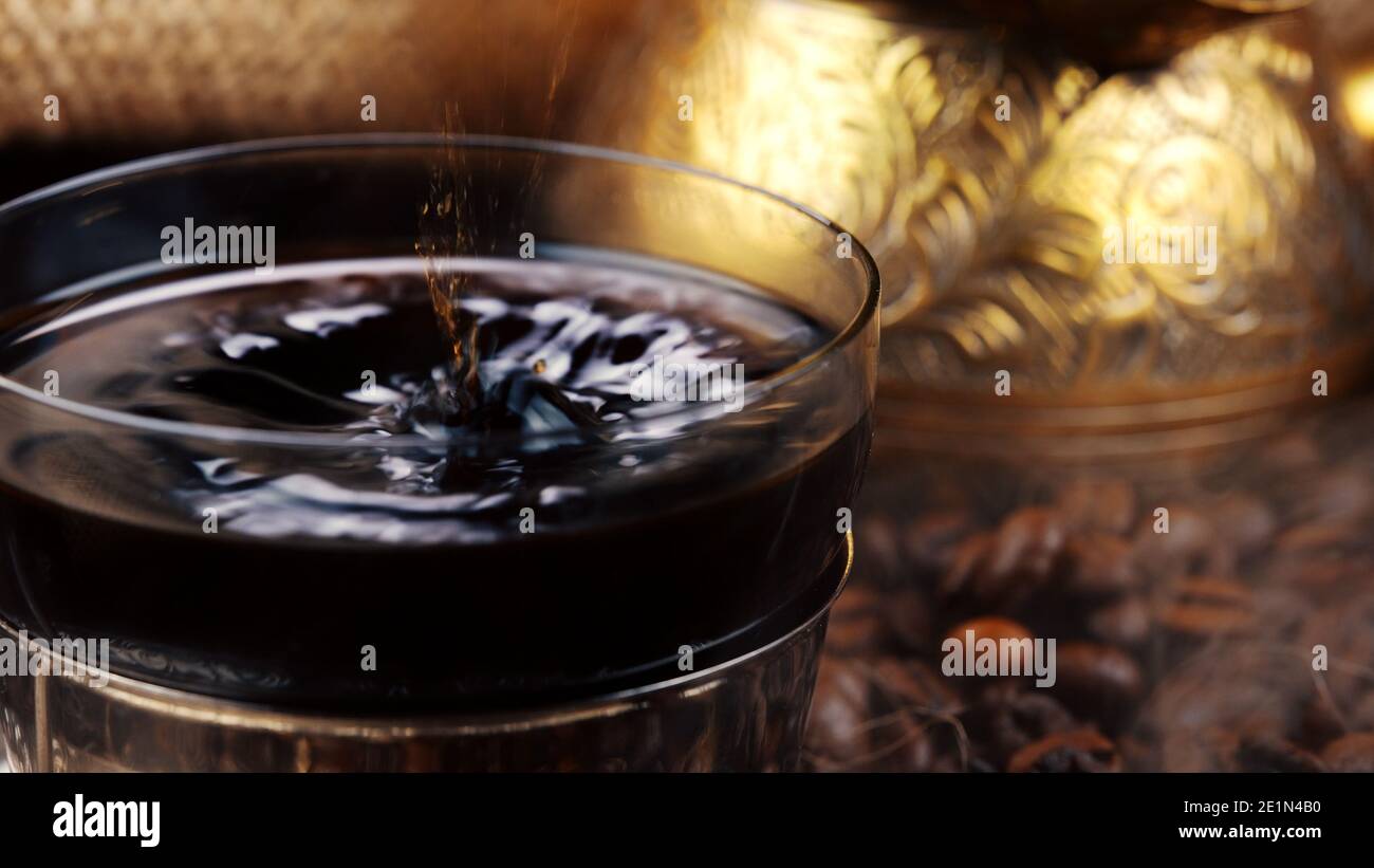 Drops falling in cup coffee hi-res stock photography and images - Alamy