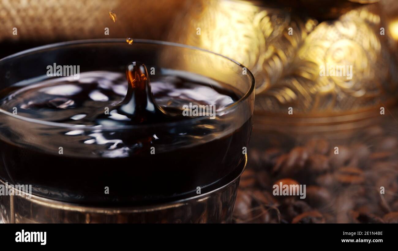Drops falling in cup coffee hi-res stock photography and images - Alamy