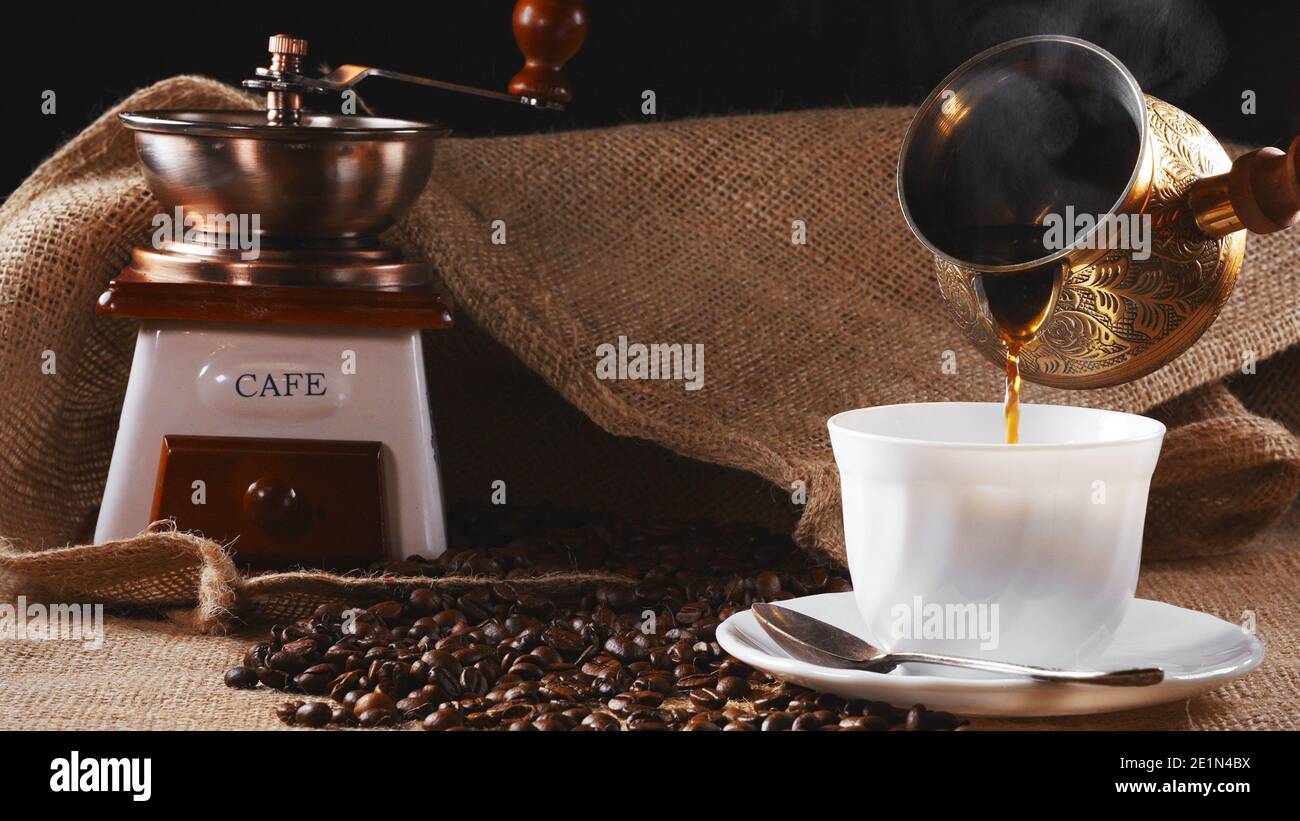 Hand pouring coffee beans from hi-res stock photography and images - Alamy