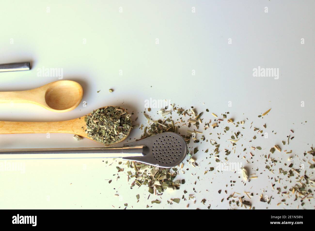 Bombilla and spoon on white backround. Yerba mate compositon Stock ...