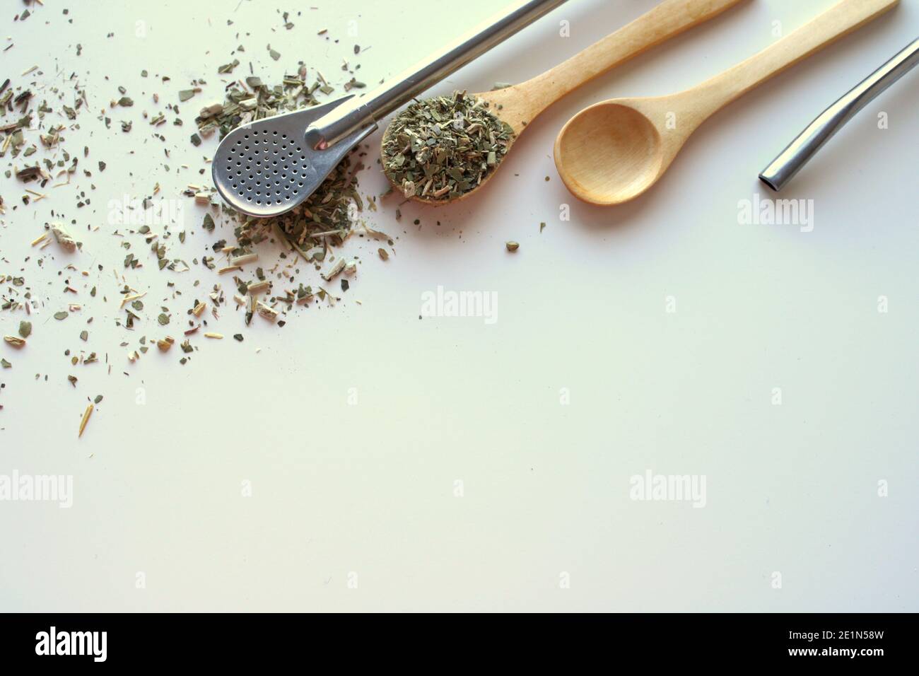 Bombilla and spoon on white backround. Yerba mate compositon Stock ...