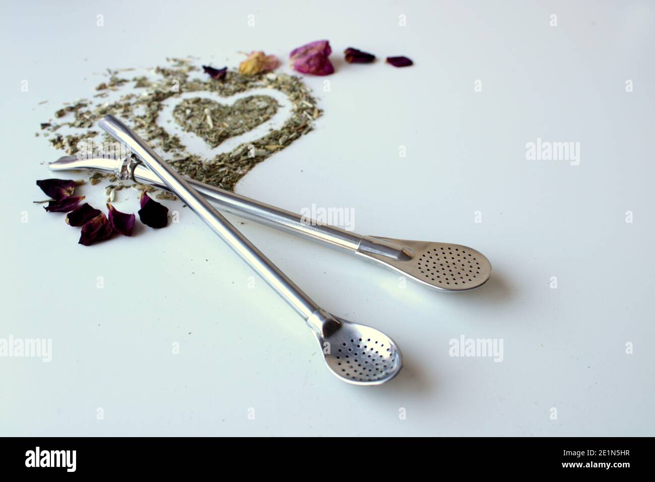 Bombilla and spoon on white backround. Yerba mate compositon Stock ...
