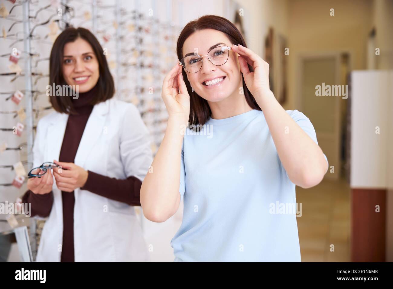 Putting on eye glasses hi-res stock photography and images - Alamy