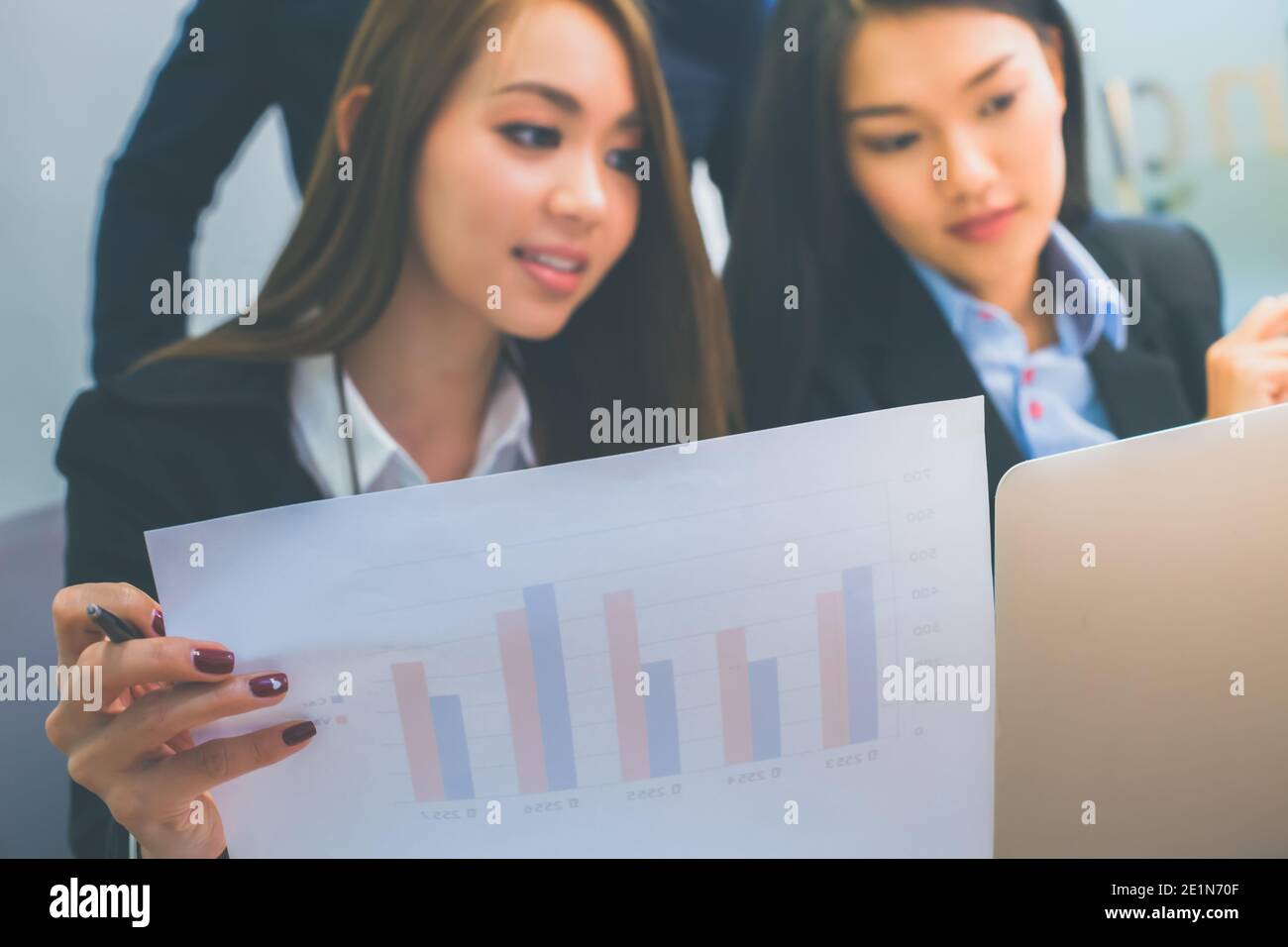 people hold paper in meeting room Stock Photo - Alamy