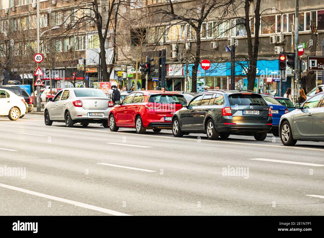 Car traffic at rush hour in downtown area of the city. Car pollution ...