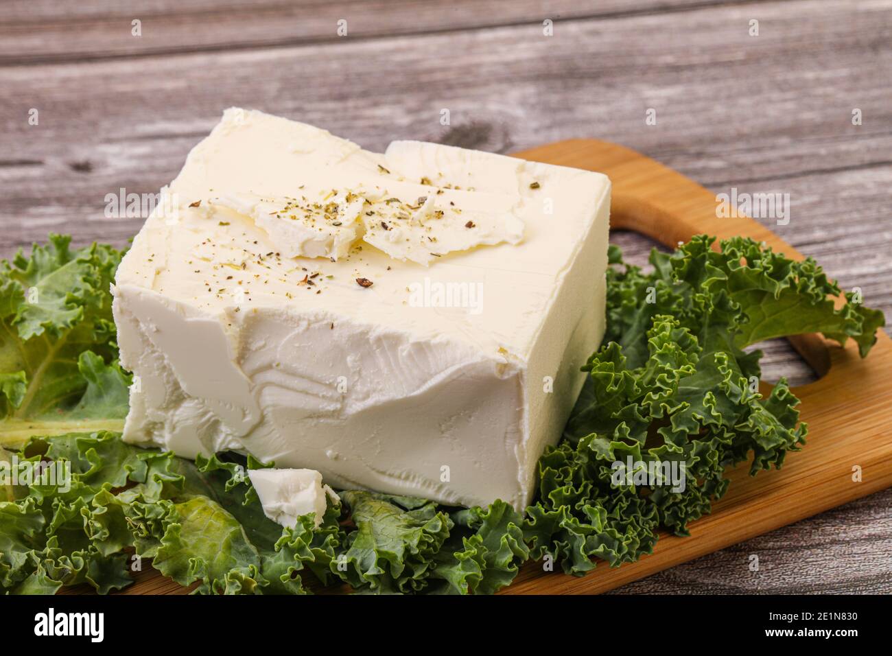 Traditional tasty Greek Feta soft cheese brick Stock Photo - Alamy