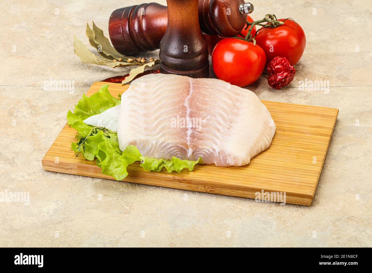 Raw pangasius fillet fish for cooking Stock Photo - Alamy