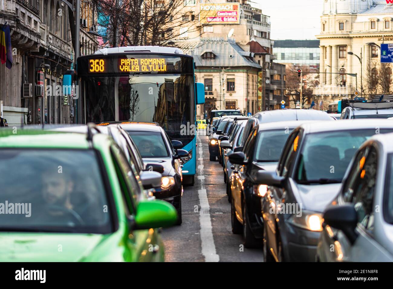 Car traffic at rush hour in downtown area of the city. Car pollution ...