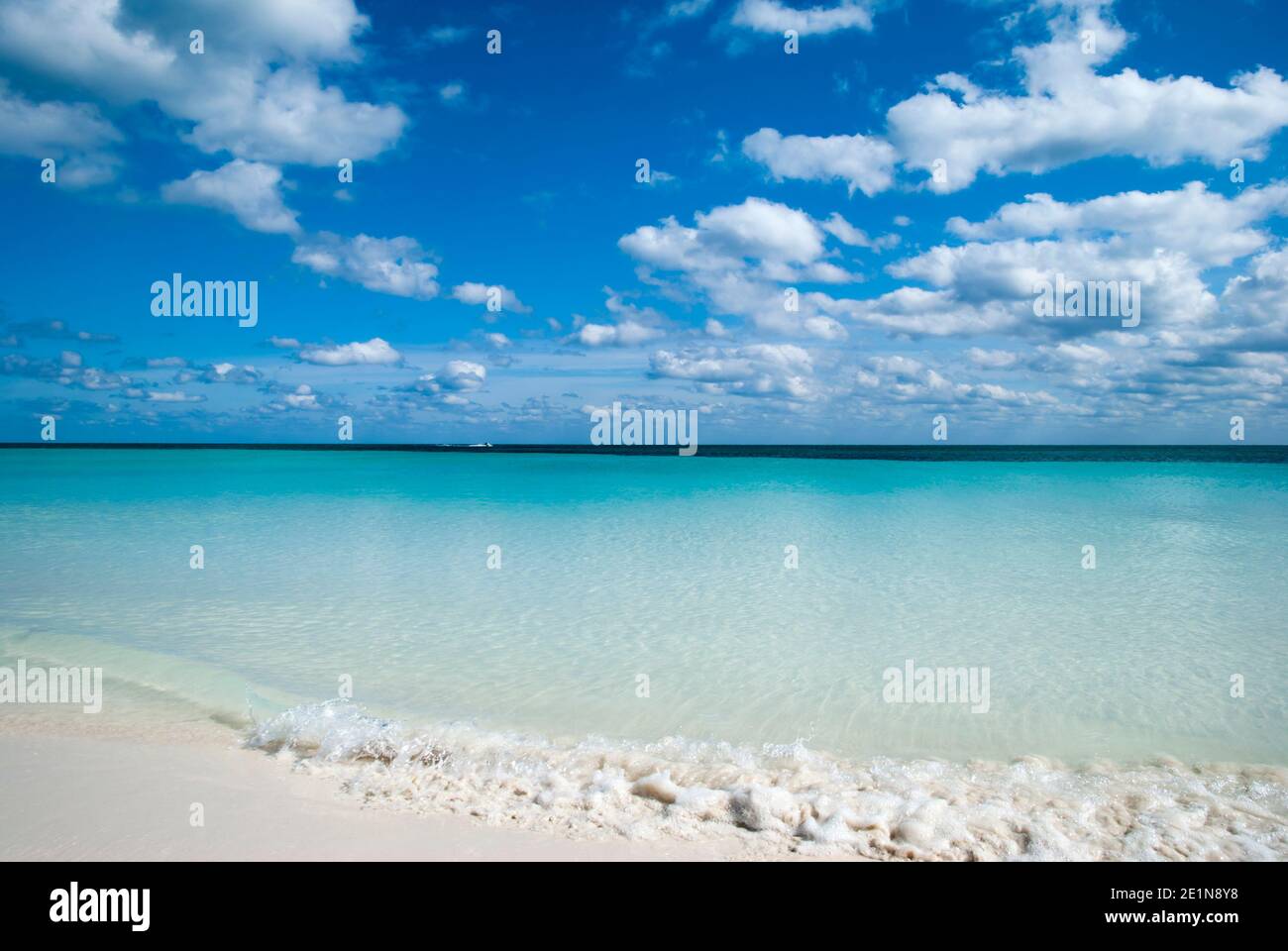 The colorful Lucaya beach waters in Freeport town on Grand Bahama ...