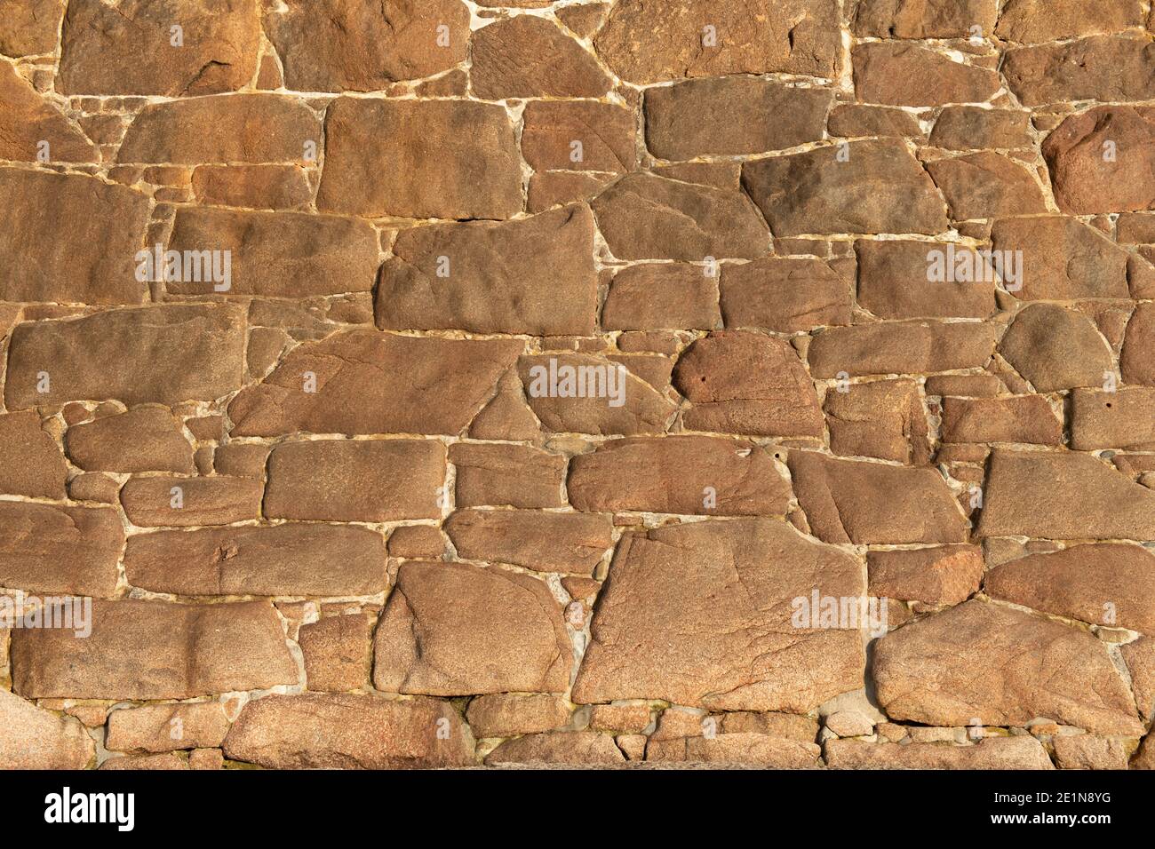 Granite sea wall, made with natural shaped stone, St Ouen Bay, Jersey ...